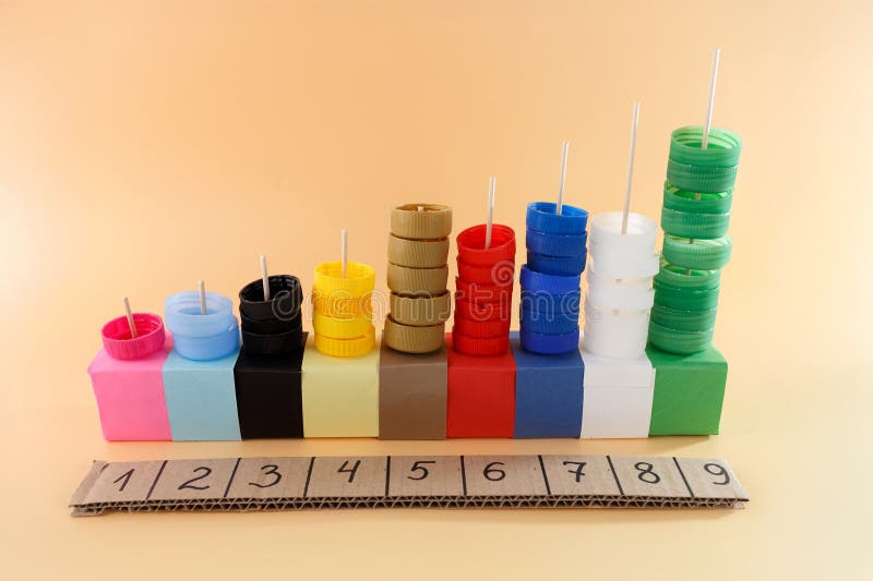 Colorful Bottle Cap Stacks on Blocks, Educational Counting Activity ...