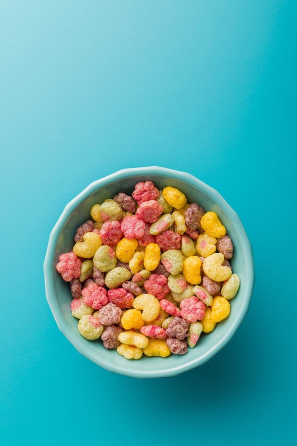 Colorful Breakfast Cereals in the Shape of Various Fruit in Bowl on ...
