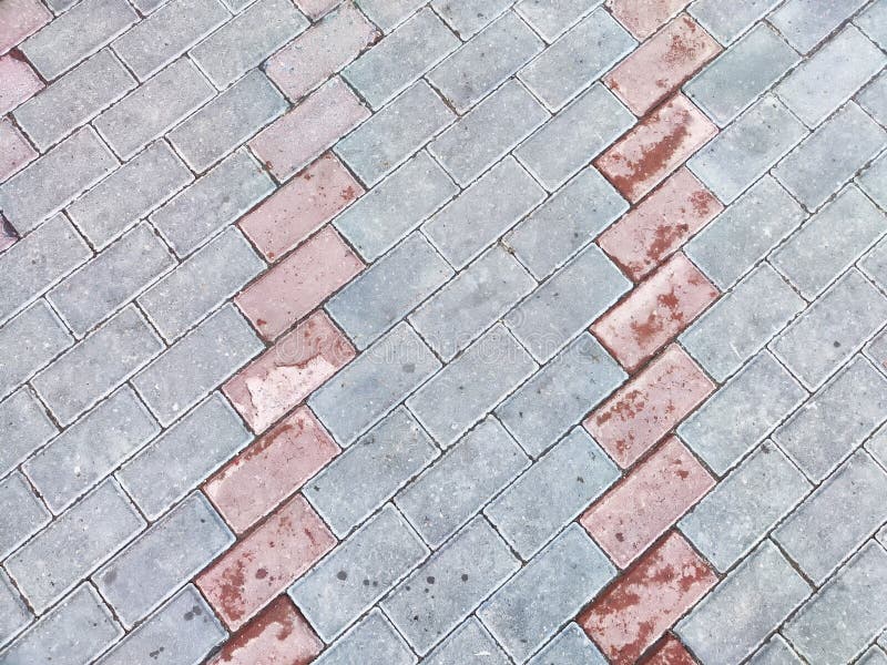 Colorful Brick Pathway Featuring a Zigzag Pattern in a New Outdoor Setting on a Cloudy Day Stock ...