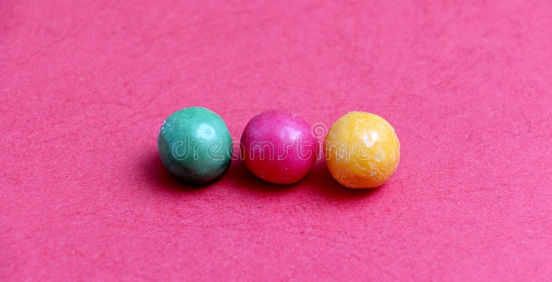 Colorful Bubble Gums on a Red Background Stock Image - Image of treat ...