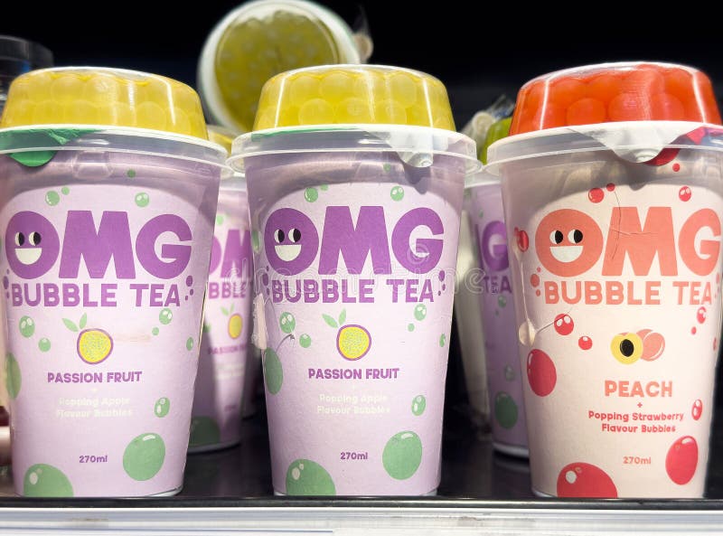 Colorful Bubble Tea Display Featuring Passion Fruit and Peach Flavors ...