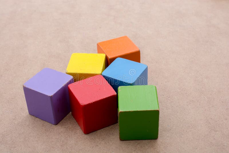 Colorful Building Blocks on Brown Background Stock Photo - Image of ...