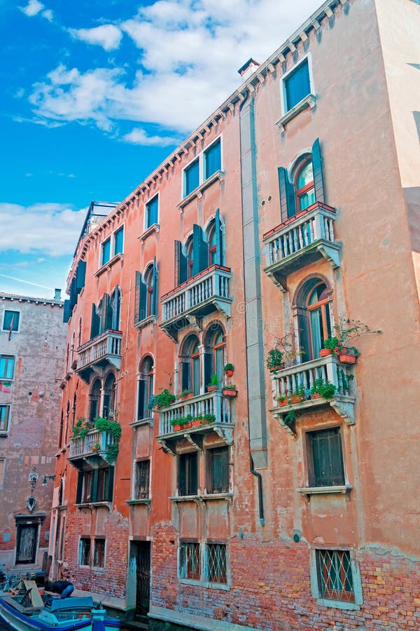 Colorful Building and Clouds Stock Photo - Image of international ...