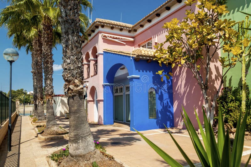 Colorful Building and Pretty Yard Stock Photo - Image of paradise ...