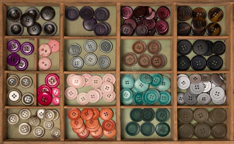 Colorful buttons in a box stock illustration. Illustration of colored ...