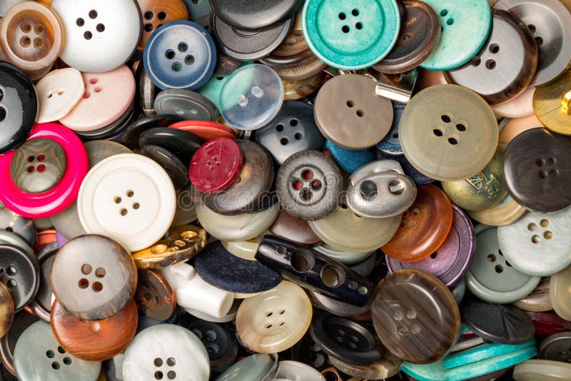 Colorful buttons in a box stock image. Image of shape - 74496837