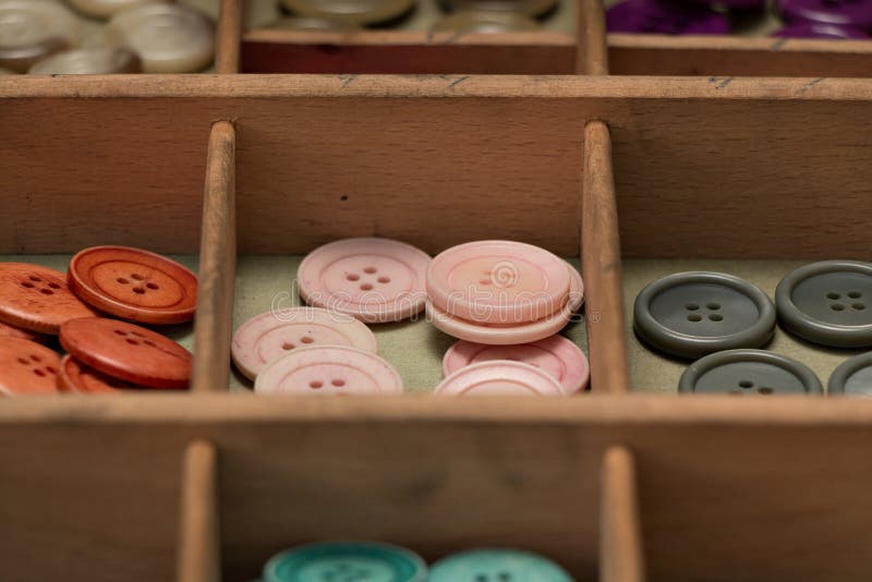 Colorful buttons in a box stock image. Image of button - 74496857