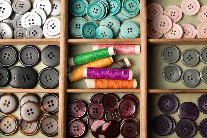 Colorful buttons in a box stock image. Image of design - 74496931
