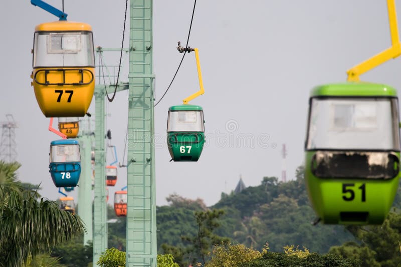 Colorful cable car hanging stock image. Image of high - 3842093