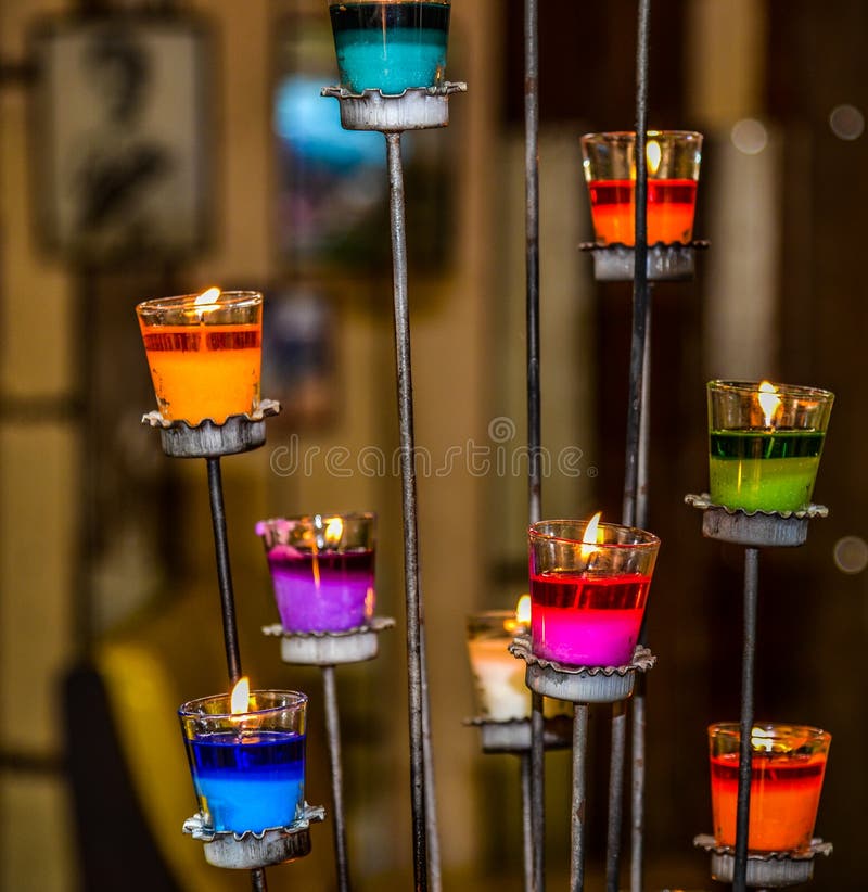 Colorful candles glass stock image. Image of fire, purple - 73363167