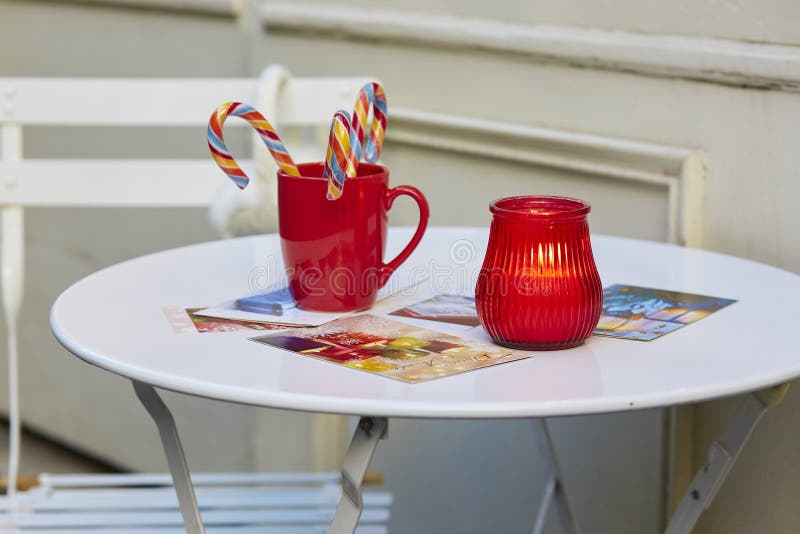 Colorful Candy Sticks, Red Mug and Candle Stock Photo - Image of candle ...