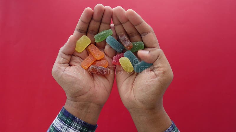 Top View of Colorful Candy Sweet Jelly on Hand Stock Video - Video of ...