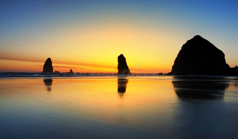 Colorful Cannon Beach Sunset Stock Image - Image of colorful, pacific ...