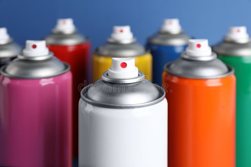 Colorful Cans of Spray Paints on Red Background Stock Image - Image of ...