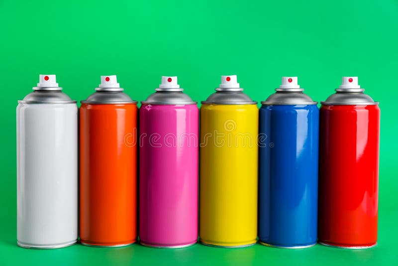 Colorful Cans of Spray Paints on Green Background Stock Photo - Image ...
