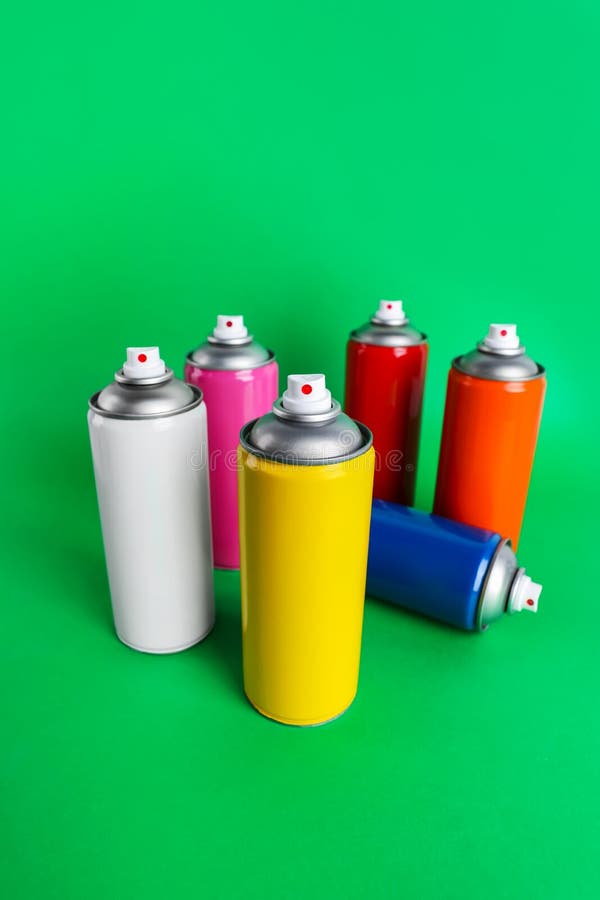 Colorful Cans of Spray Paints on Green Background Stock Photo - Image ...