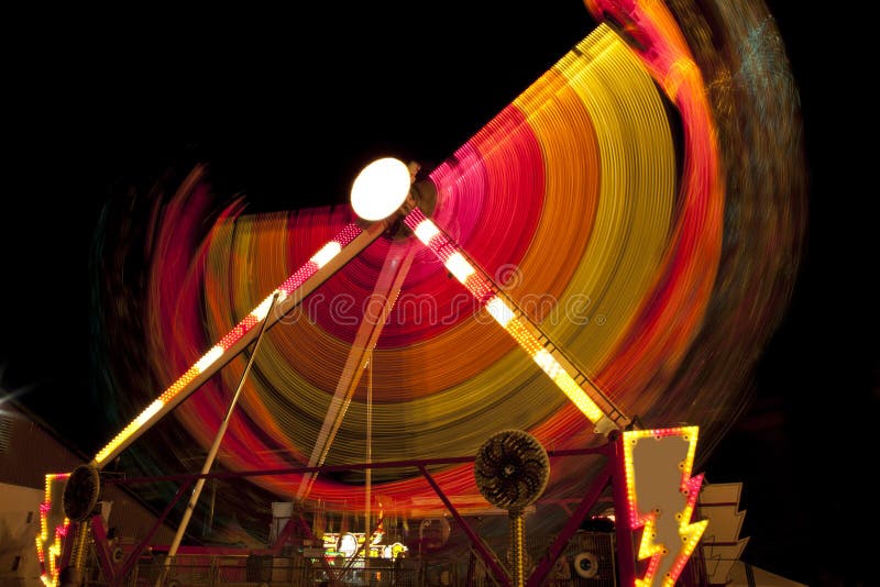 Colorful Carnival Ride in Motion Stock Image - Image of play ...