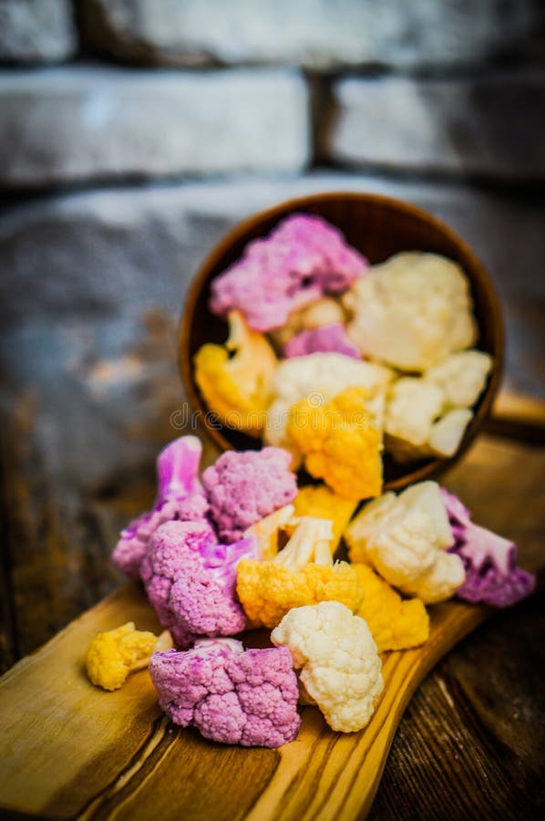 Colorful Cauliflower on Rustic Background Stock Photo - Image of ...