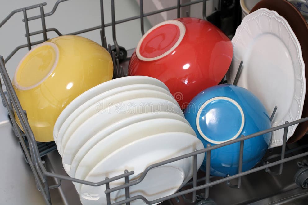 Colorful Ceramic Bowls and Plates Inside Dishwasher Stock Image - Image ...