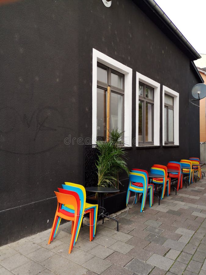 Colorful Chairs in the Cafe Stock Photo - Image of plate, food: 191301794