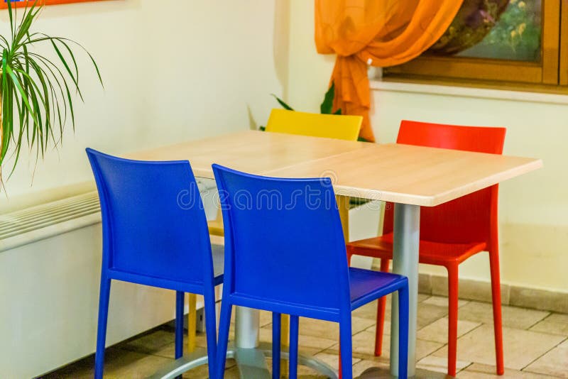Colorful chairs stock image. Image of fast, chairs, yellow - 132972803