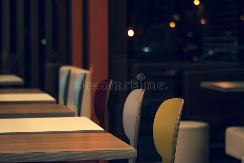 Colorful Chairs and Tables in a Restaurant Stock Photo - Image of ...