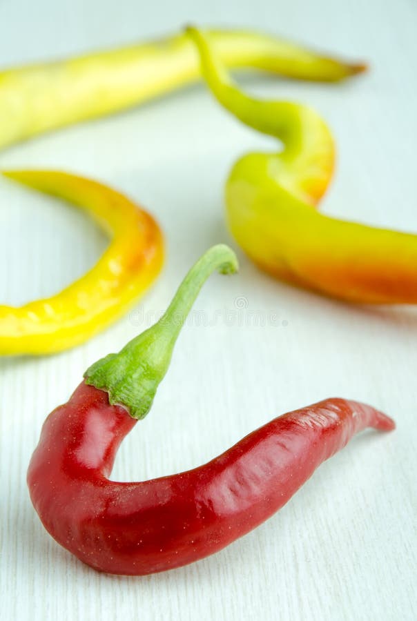 Colorful chili peppers stock image. Image of burning - 26968381