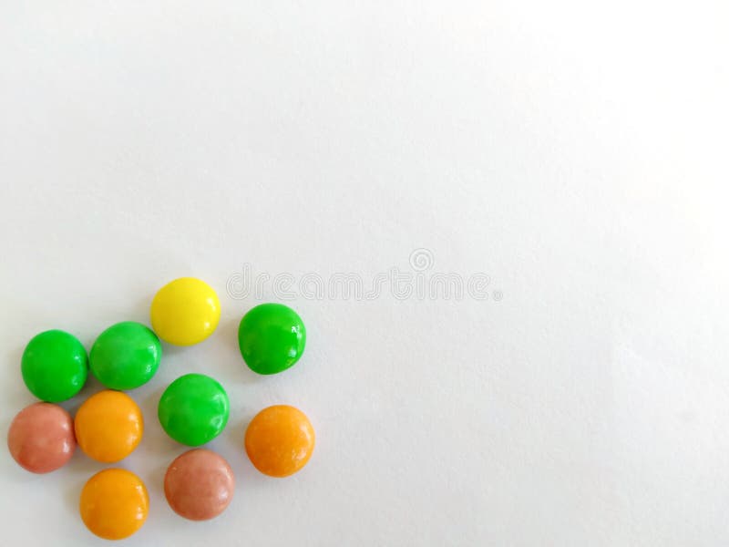 Colorful Chocolate Candy on White Paper Stock Photo - Image of candy ...