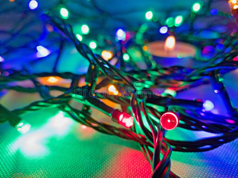 Colorful Christmas lights stock image. Image of flame - 136593553