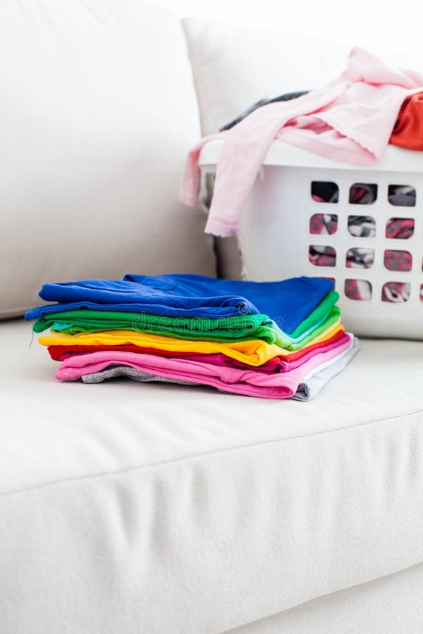 Colorful clean clothes stock image. Image of heap, garment - 107948543