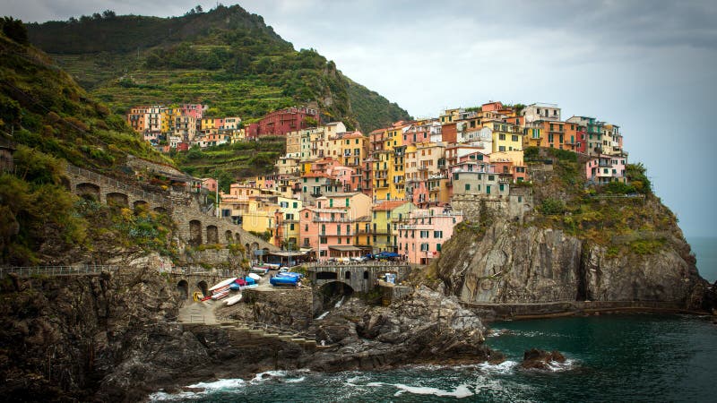 Colorful Cliff - Side Village by the Sea Stock Illustration ...