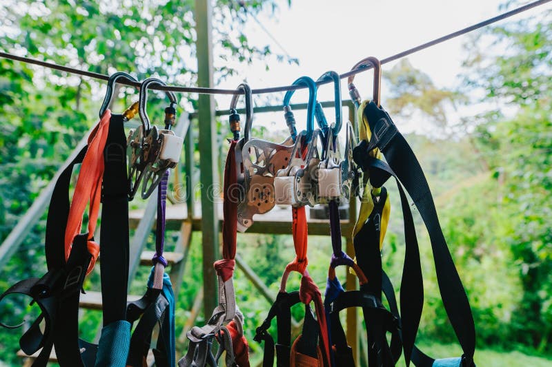 Colorful Climbing Harnesses Suspended from a Rope Stock Photo - Image ...
