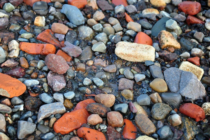 Bricks and Rocks stock image. Image of blue, beach, pebbles - 214086277