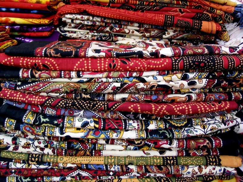 Colorful cloth in piles stock photo. Image of ornate - 55909680