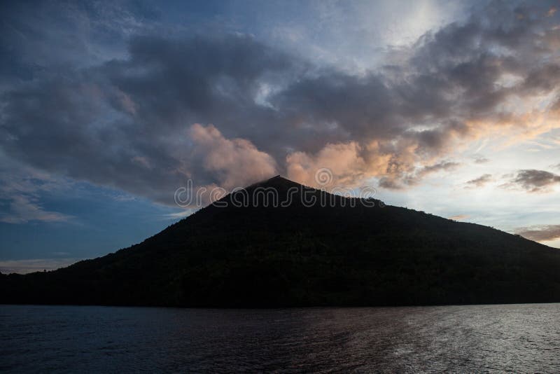 Colorful Clouds and Volcano in Banda Islands Stock Photo - Image of ...