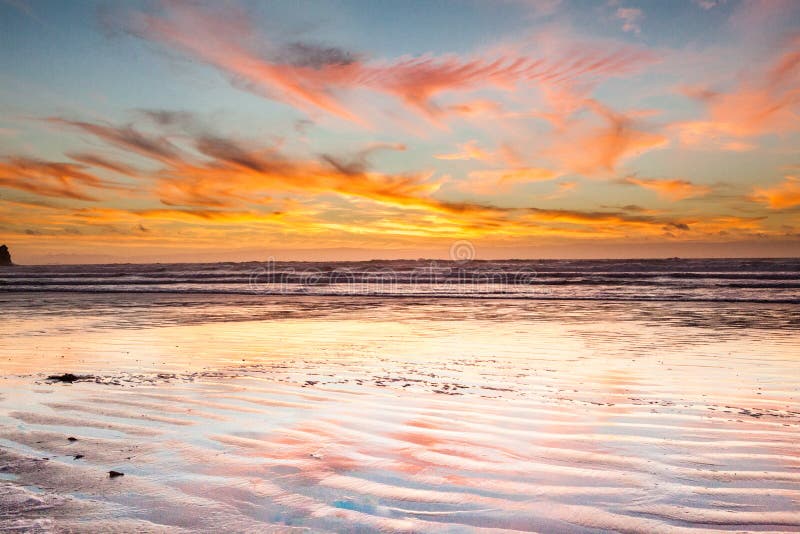 Colorful Cloudy Sunset at the Beach with Reflection - Horizontal Stock ...