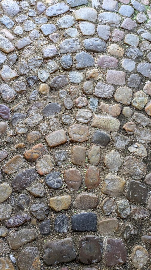 Colorful Cobblestone Pavement with Various Sizes and Shapes of Stones ...