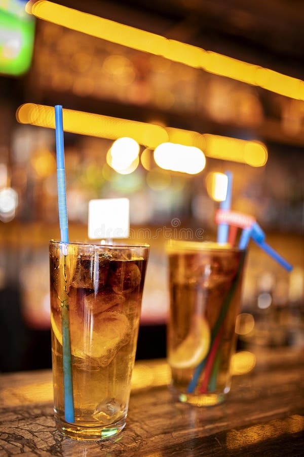 Colorful Cocktails in the Bar Stock Photo - Image of orange, liquid ...