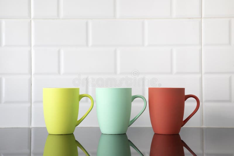 Colorful coffee mugs stock photo. Image of kitchen, mugs - 132803384