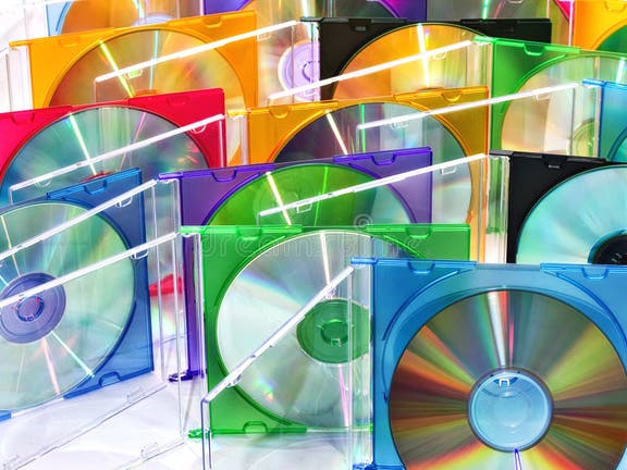 Colorful Compact Discs in Boxes Stacked in a Pile As Background Stock ...