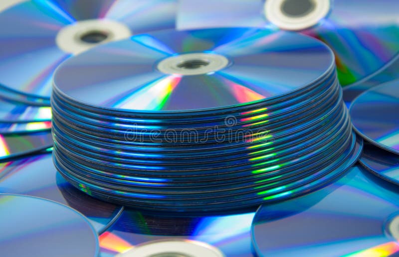 Colorful Compact Discs Set of DVD Scattered on a Table. Stock Image ...