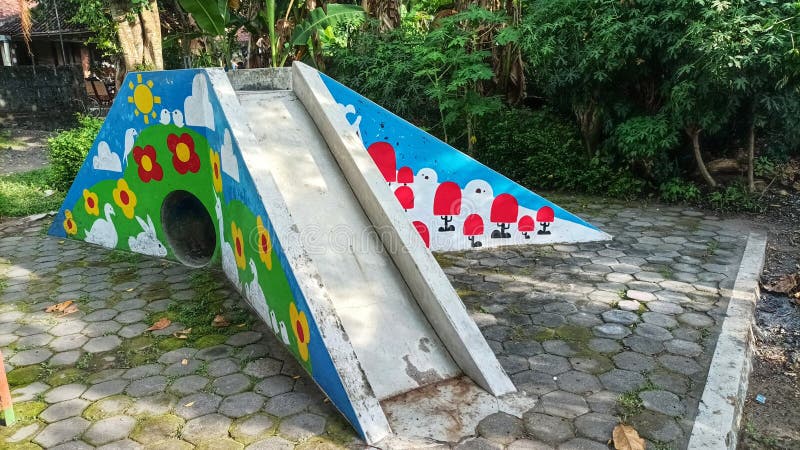Colorful Concrete Slide in Outdoor Playground Stock Image - Image of ...