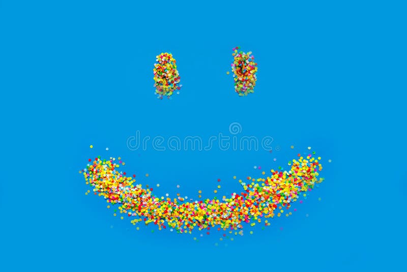 Smiling face of confetti. stock photo. Image of blue - 116159448