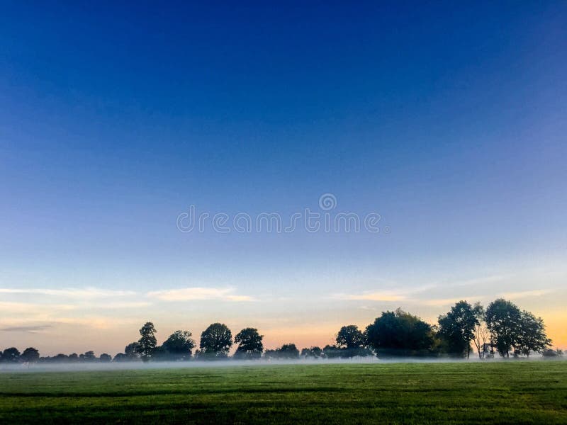 Colorful Countryside Sunrise with Trees Stock Image - Image of grass ...