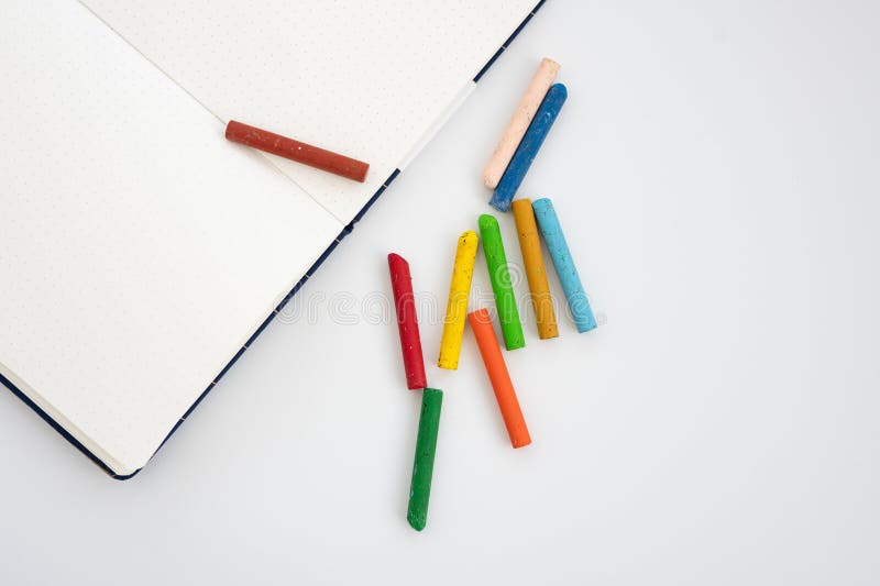Colorful Crayons on Open Notebook for Creative Art Projects. Crayola ...
