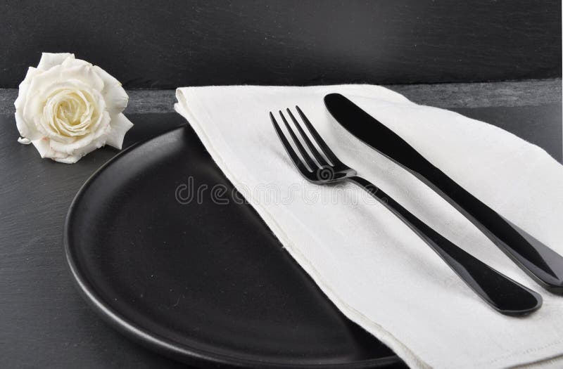 White Rose and Table Setting on Slate Stock Image - Image of rock ...