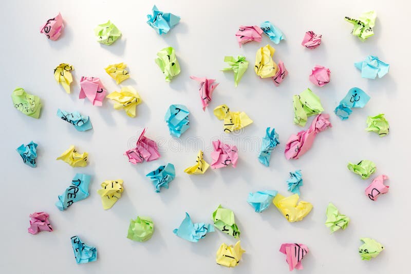 Colorful Crumbled Paper Sticky Notes on a White Isolated Background ...