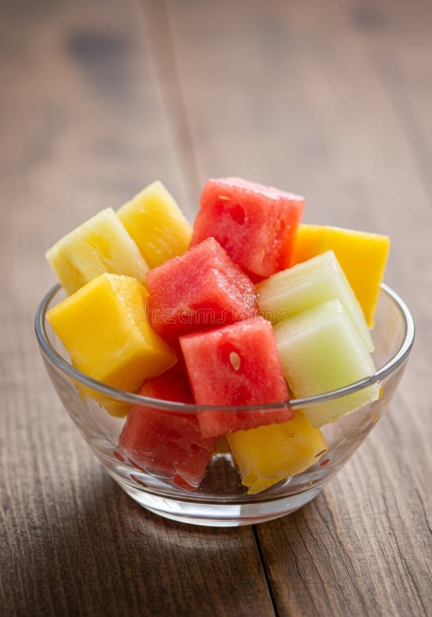 Colorful Cubed Fruit Salad in Glass Bowl Stock Illustration ...