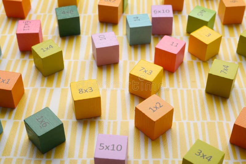 Colorful Cubes with Numbers and Multiplications on Yellow Background ...