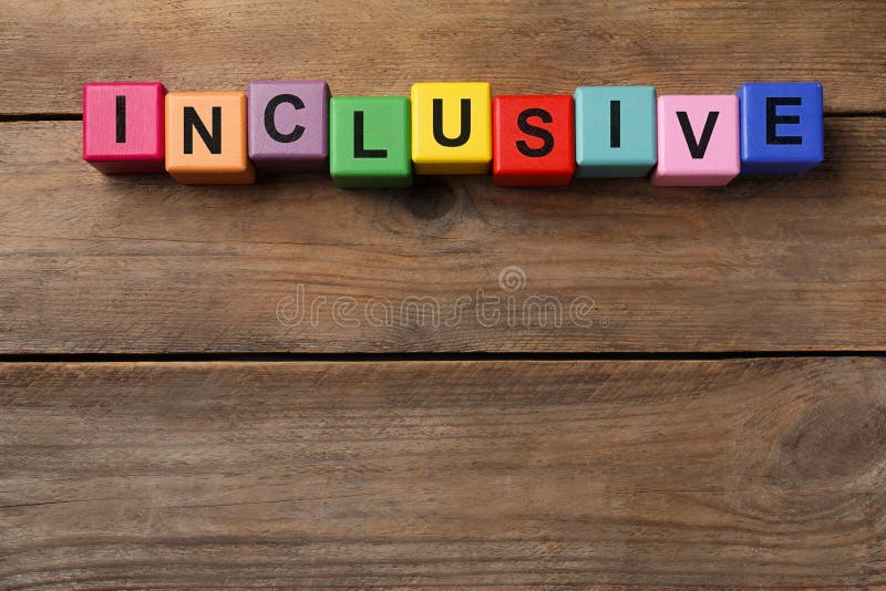 Colorful Cubes with Word Inclusive on Wooden Table, Flat Lay. Space for ...